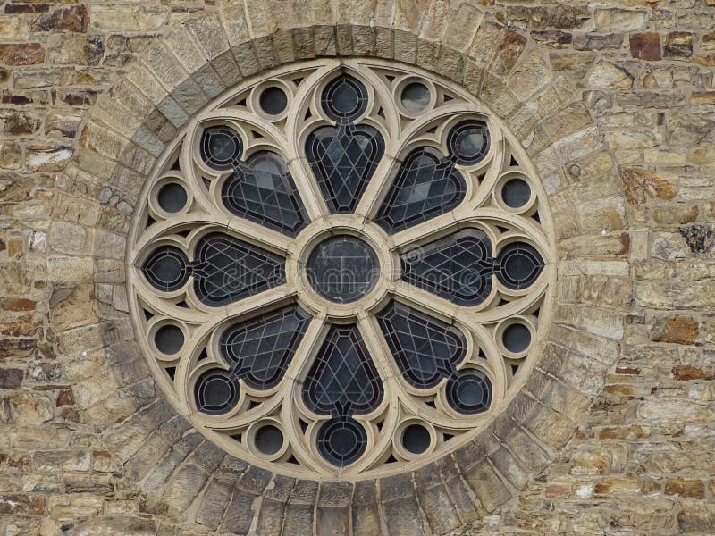 Extravagant Gothic Style Circular Window on the Brick Wall of a ...