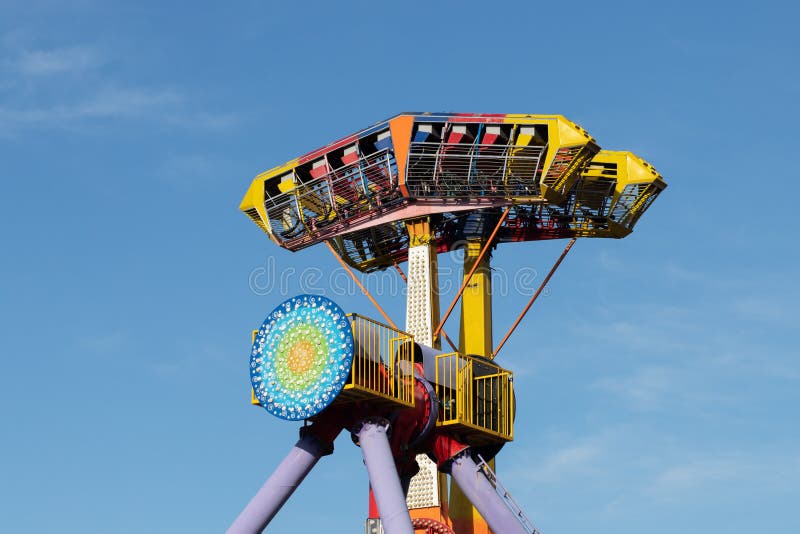 Extreme Attraction in the Amusement Park, Overturning Bus at the Fair ...