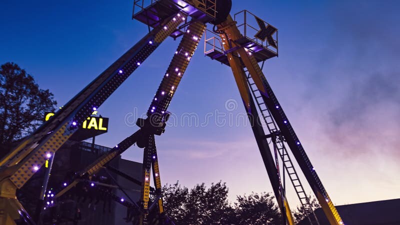 Extreme Carousel at Funfair at Sunset Stock Video - Video of light ...
