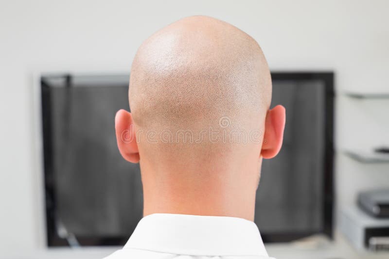Extreme Close Up of a Bald Man Using Computer Stock Photo - Image of ...