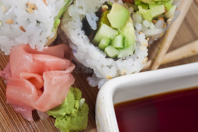 Extreme Close Up on Sushi and Garnish Stock Image - Image of cucumber ...