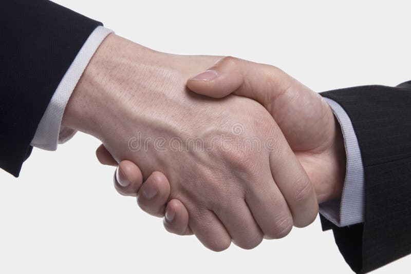 Extreme Close Up of Two Businessmen Shaking Hands, Studio Shot Stock ...