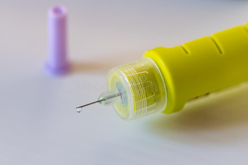 Extreme Closeup of the Front End and Needle of a Insulin Injector Stock ...
