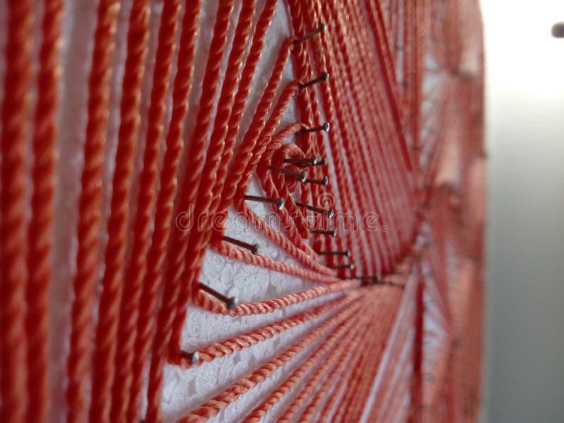 Extreme Closeup of Homemade Abstract Art Using Red String and Nails on ...