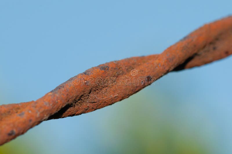 Closeup of Rusted Wire on Blue Background Stock Photo - Image of blue ...