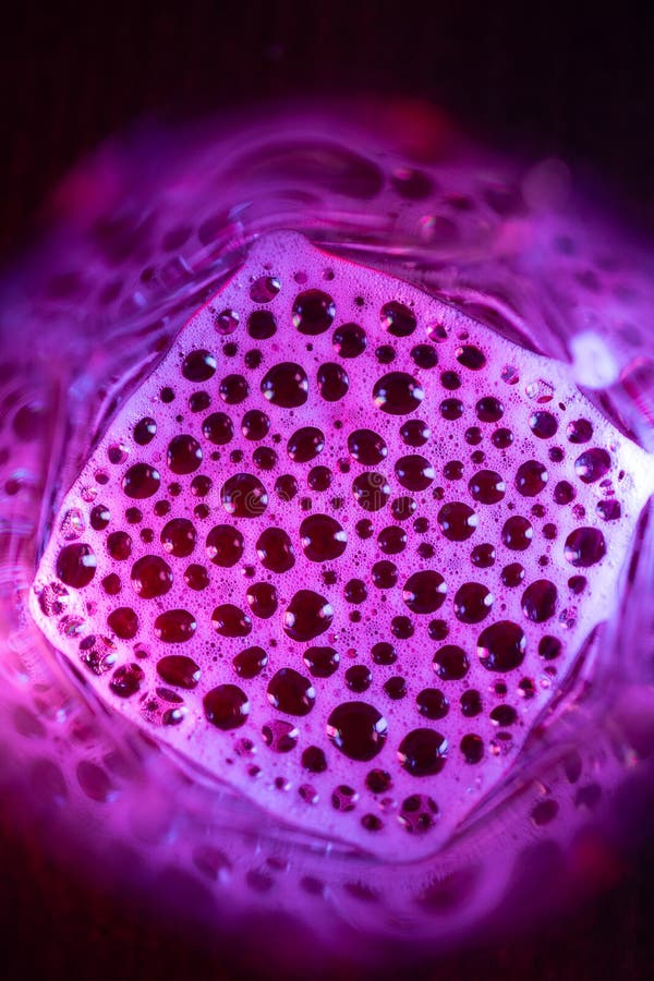 This is an Extreme Closeup Shot of a Purple Liquid that Has Bubbles ...