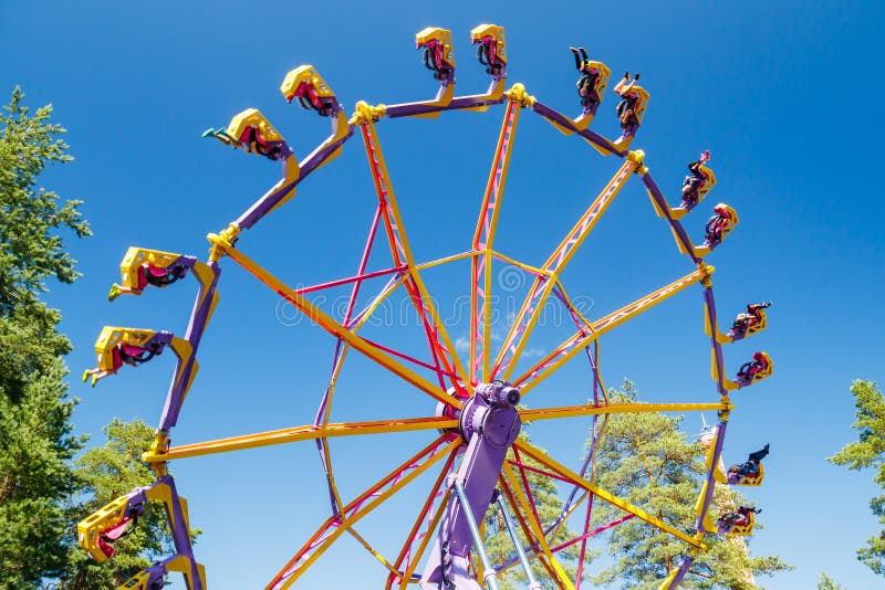 Extreme Ride in Motion in Amusement Park at Sunny Day Editorial ...