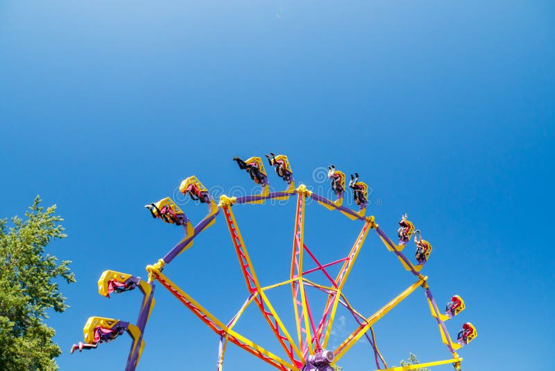 Extreme Ride in Motion in Amusement Park at Sunny Day Editorial Image ...