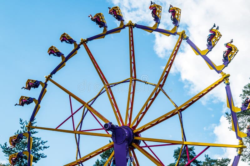 Extreme Ride in Motion in Amusement Park at Sunny Day Editorial ...
