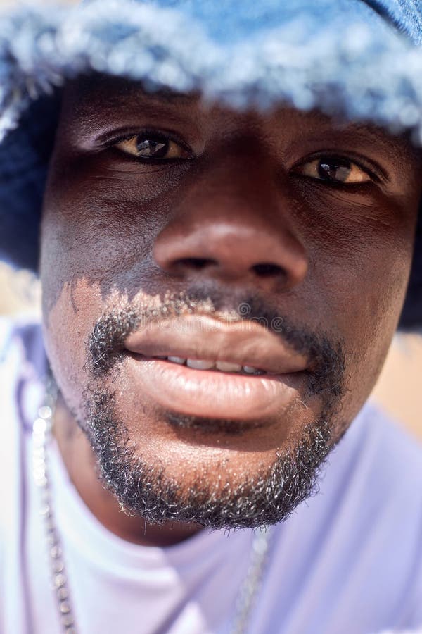 Extreme Young Black Man Face Looking at Camera Outdoors Stock Photo ...