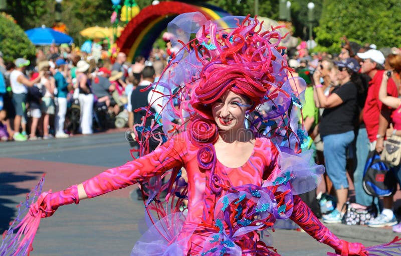 An Extremely Colorful Disney Character Performs in a Magic Kingdom ...