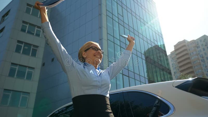 Extremely Happy Lady Rising Her Hands Up Rejoicing To Successful