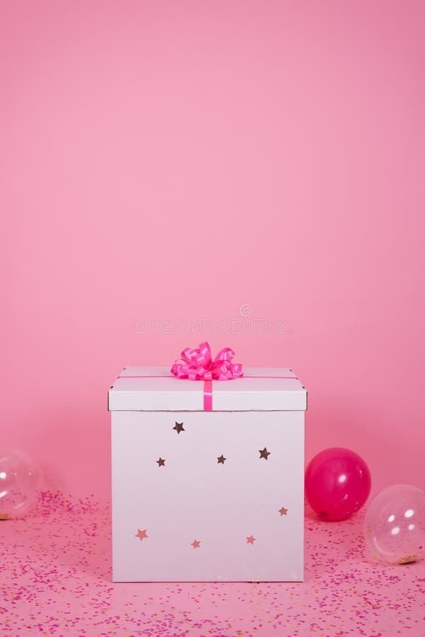Extremely Huge Birthday Present in the Room with Pink Balloons Stock ...