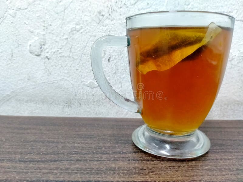 The Eye Angle a Cup of Tea is Occurring in the Right Side Wooden Table ...