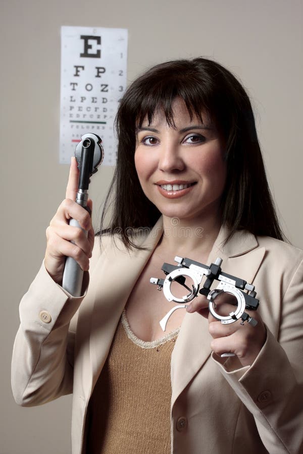Eye doctor with equipment stock photo. Image of consultation - 5843192