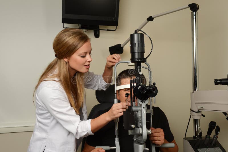 Young Eye Doctor in Her Office with Istruments Stock Photo - Image of ...