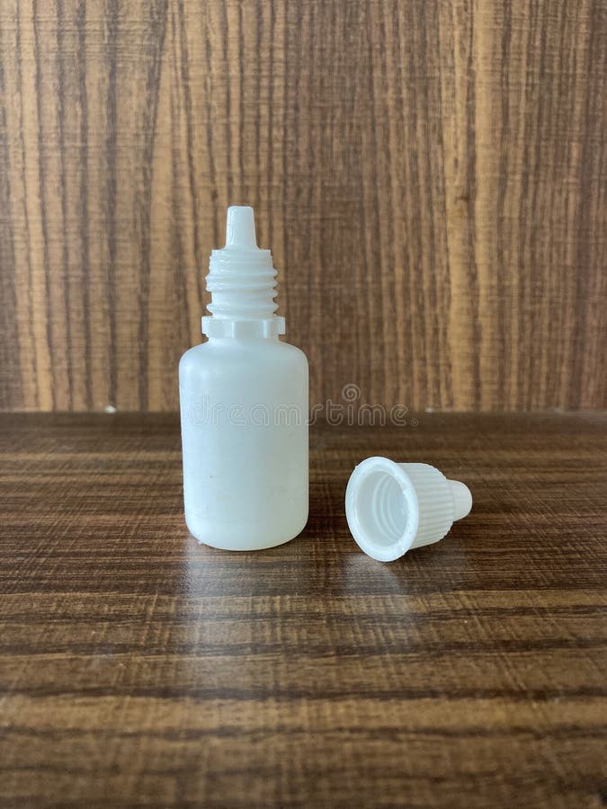 Eye and ear drop bottle stock image. Image of open, drop - 191889069