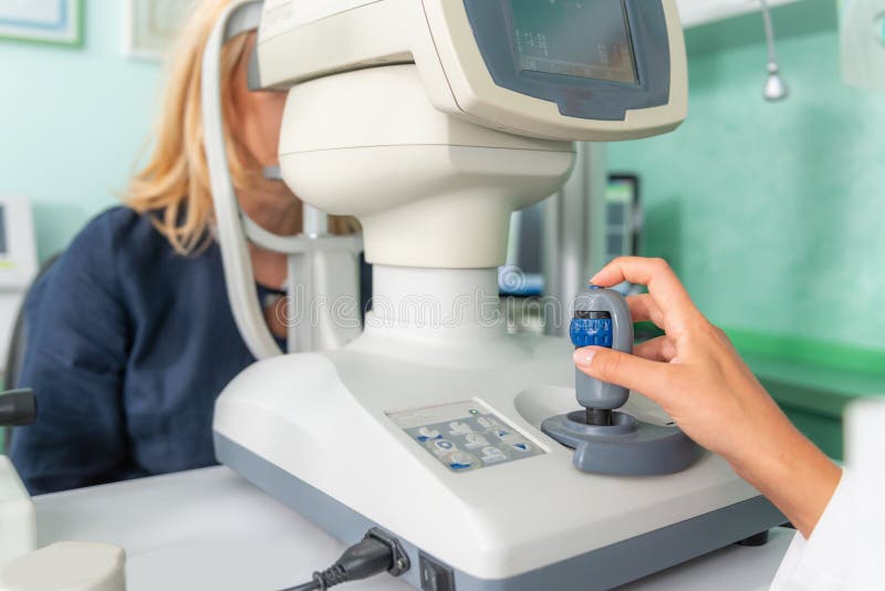 Eye Examination with an Auto Refractometer in a Professional ...