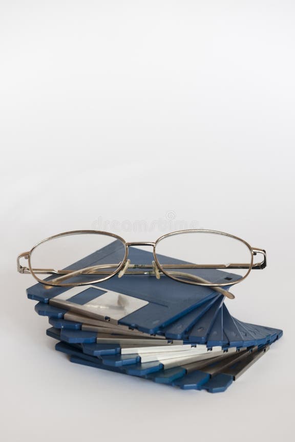 Eye Glasses on Floppy Disks Stock Photo - Image of micro, business ...