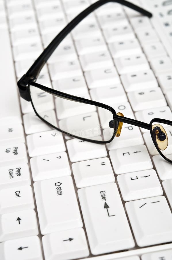 Eye glasses on keyboard stock image. Image of wear, equipment - 20696455