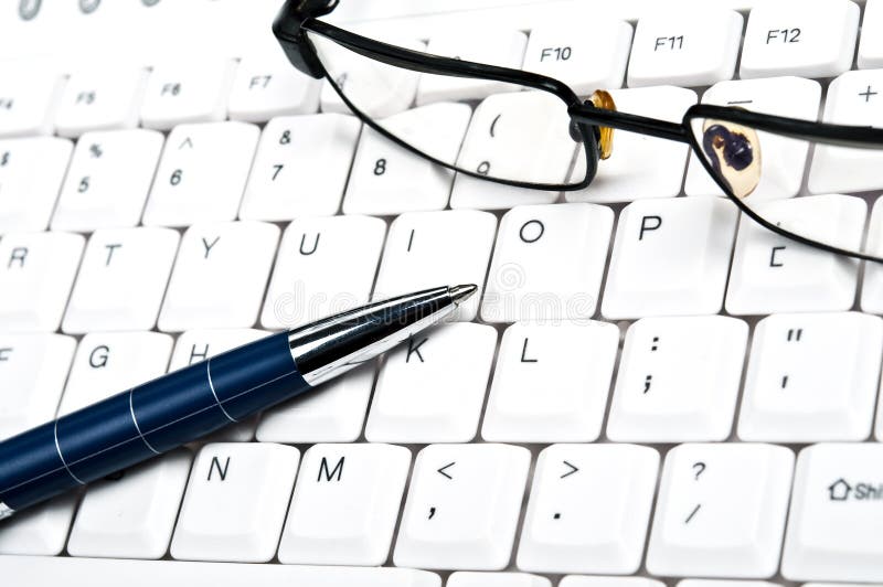 Eye glasses on keyboard stock image. Image of myopia - 20696469