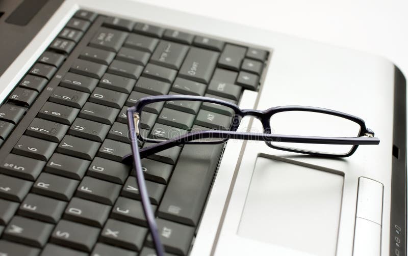 Eye glasses on laptop stock photo. Image of view, white - 9139936