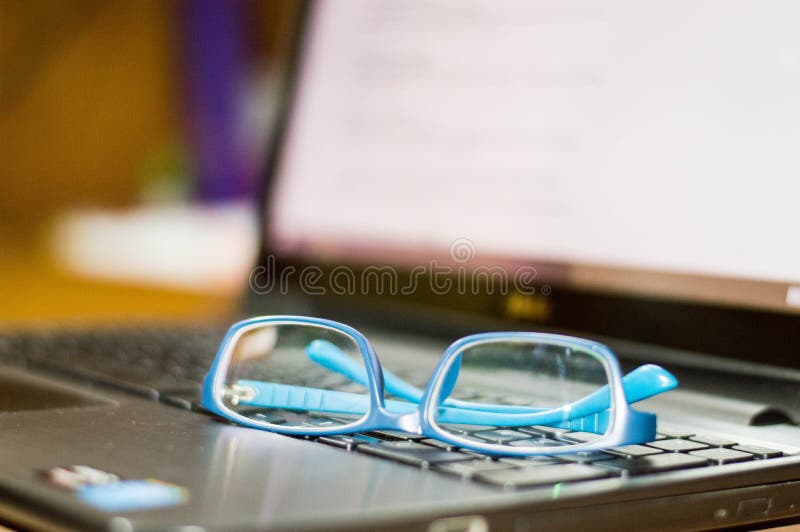 Eye Glasses on Laptop Keyboard Stock Photo - Image of electronics ...