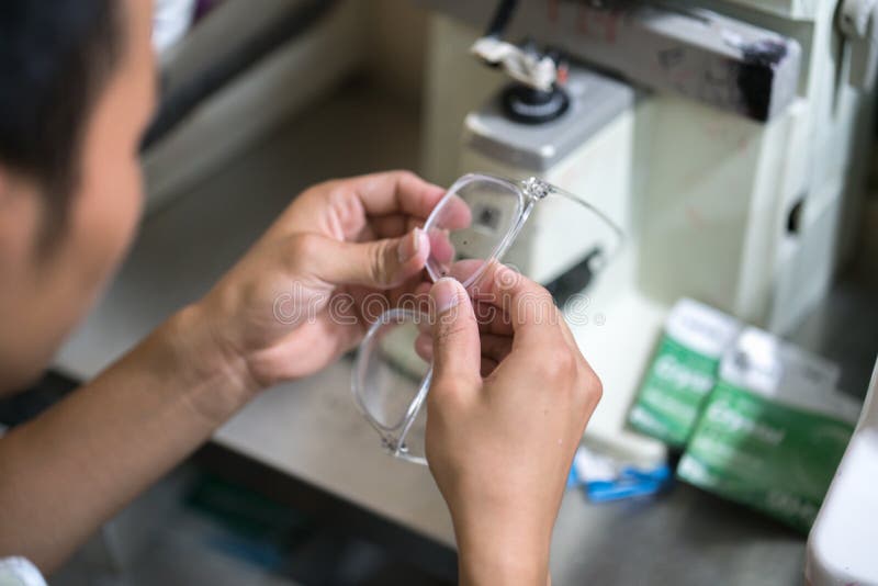 Eye Glasses is Making by Drilling Machine in Workshop Stock Photo ...