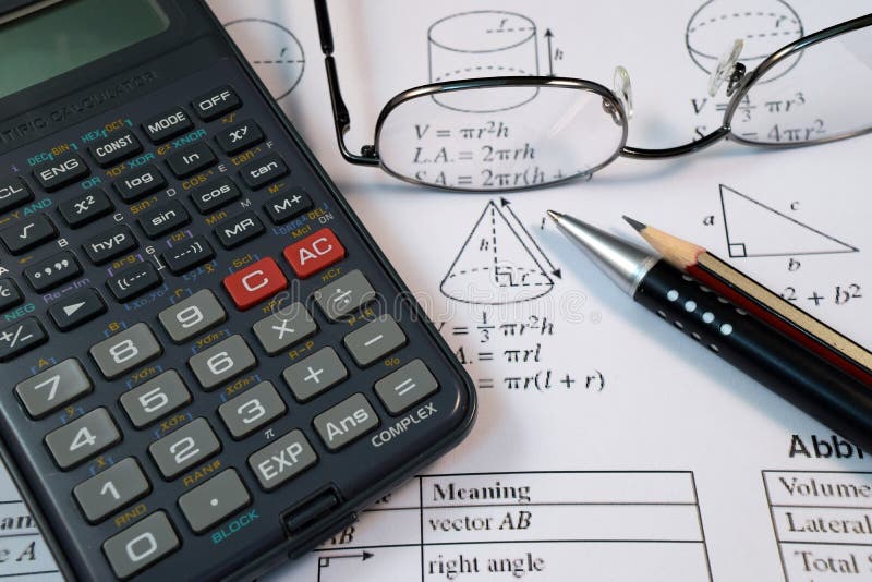 Eye Glasses, Pen and Pencil Over the Formula with Calculator Stock ...