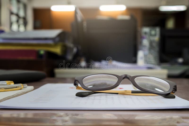 A Eye Glasses on Report Documents in Office Stock Image - Image of ...