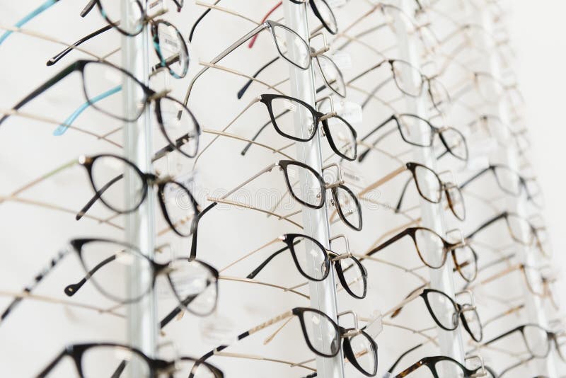 Eye glasses on the shelf. stock image. Image of choice - 244892701