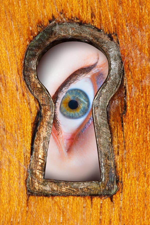 Eye Looks Through A Keyhole Stock Image - Image of espionage, lovely ...