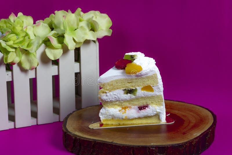 Eye Level View of Sliced Fruit Cake on a Wooden Tray Stock Image ...
