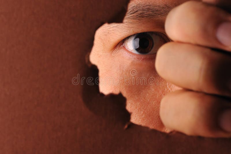Eye Looking through a Paper Hole Stock Photo - Image of hole, peek: 8493326