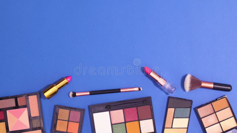 Eye Shadow Palettes and Brushes Move on Bottom of Dark Blue Background ...