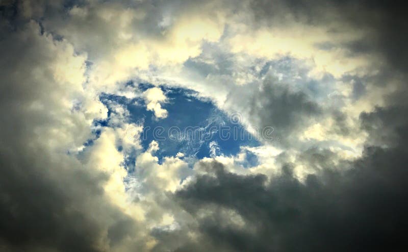 `Eye in the Sky` . Storm Clouds with a Vignette Stock Image - Image of ...