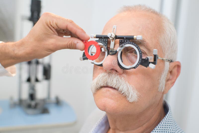 Eye Specialist Determines Distance Eyes Pupils To Patient Stock Image ...