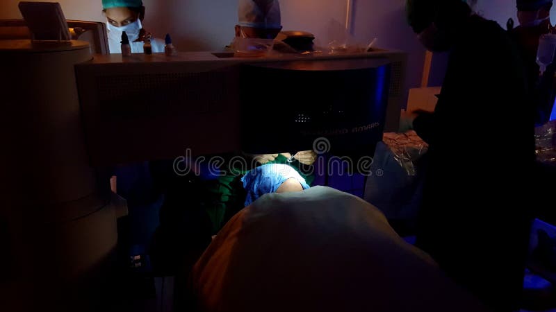 Eye Surgery in Dark Operation Theatre Editorial Stock Photo - Image of ...