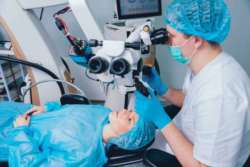 Eye Surgery. a Patient and Surgeon in the Operating Room Stock Image ...