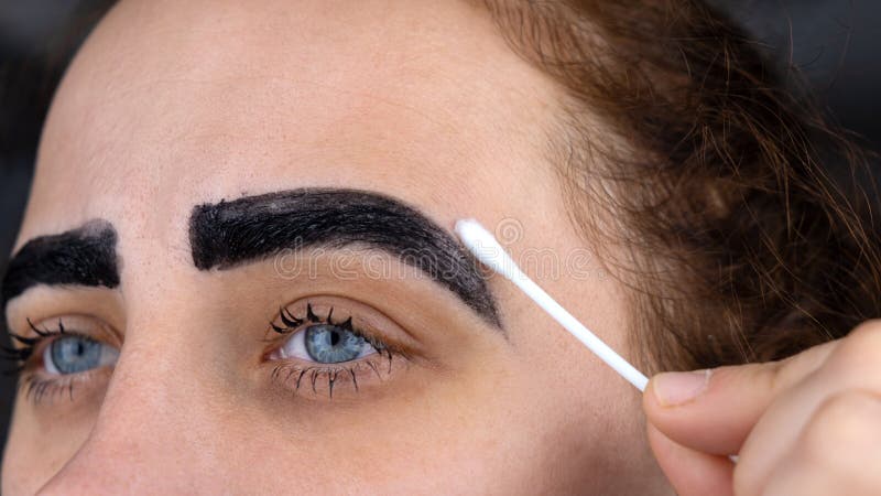 Eyebrow Dyeing Procedure, Girl Wipes Paint from Her Eyebrows Stock ...