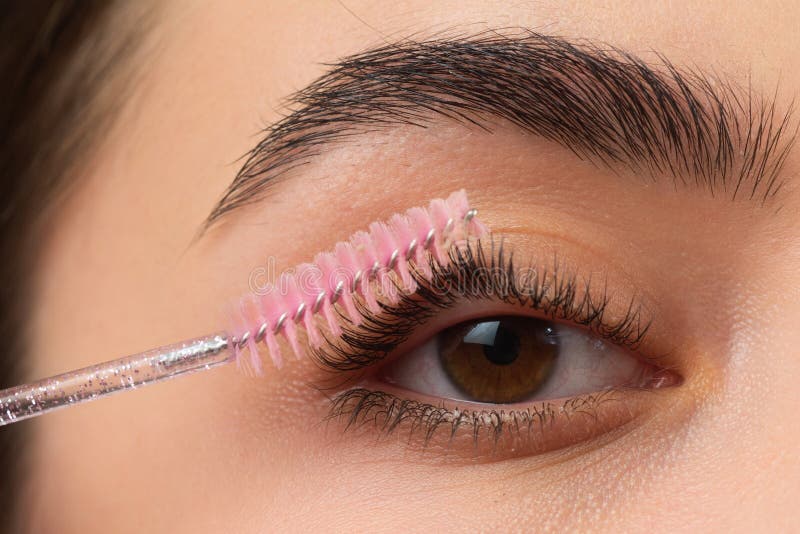 Eyebrow Shaping. Close Up of Woman Getting Eyebrow Make-up. Macro of ...