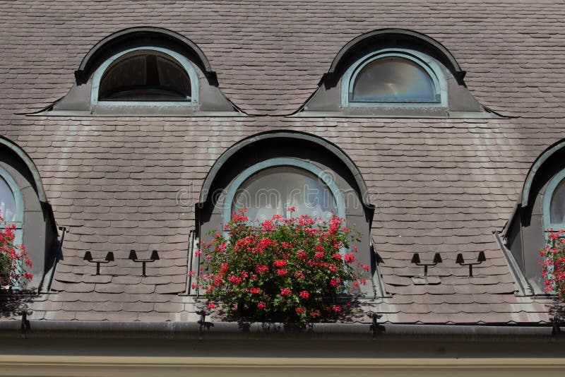 Eyebrow windows in Hungary stock image. Image of roof - 34404271