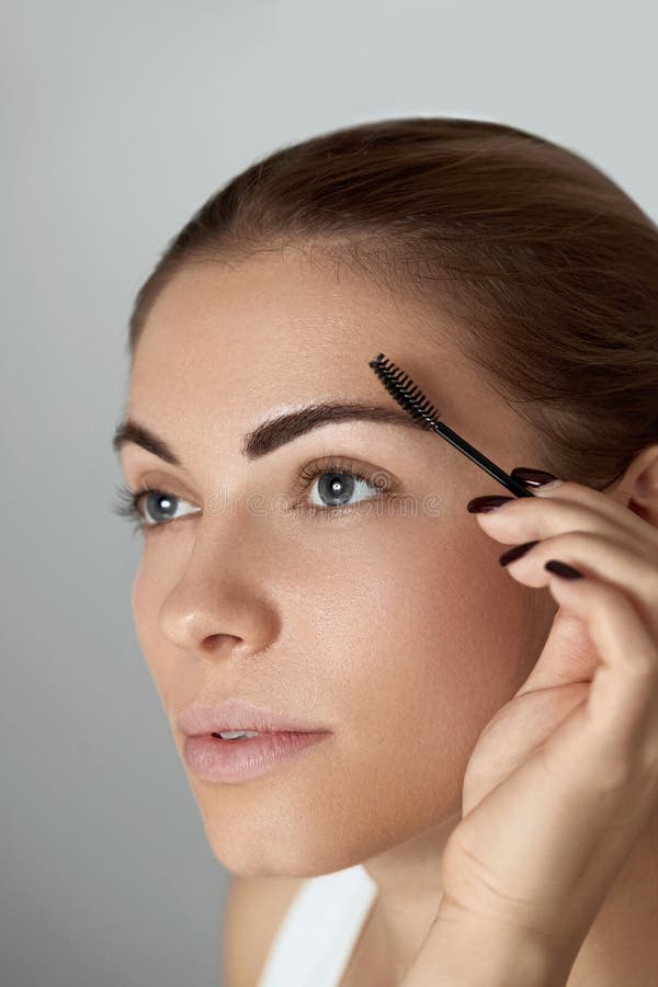 Correction Of Eyelashes Portrait Of Young Beautiful Woman Making Curl