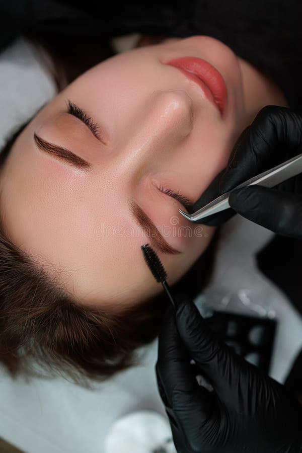 Eyebrows with Permanent Makeup Master Makes Care of Them. Eyebrow ...