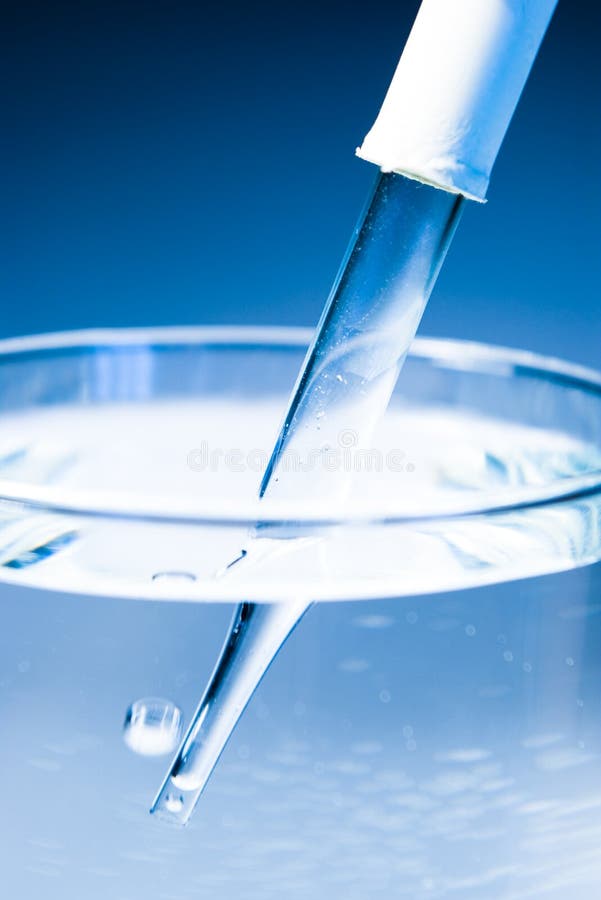 Glass Flask with Wateglass Flask with Water Drop in Blue Sciene ...