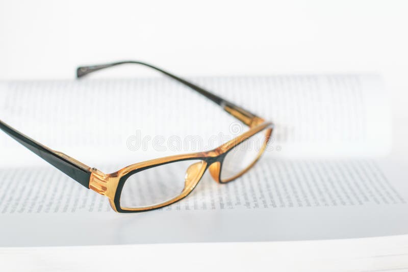 Eyeglass on book stock photo. Image of eyeglasses, reading - 61170118