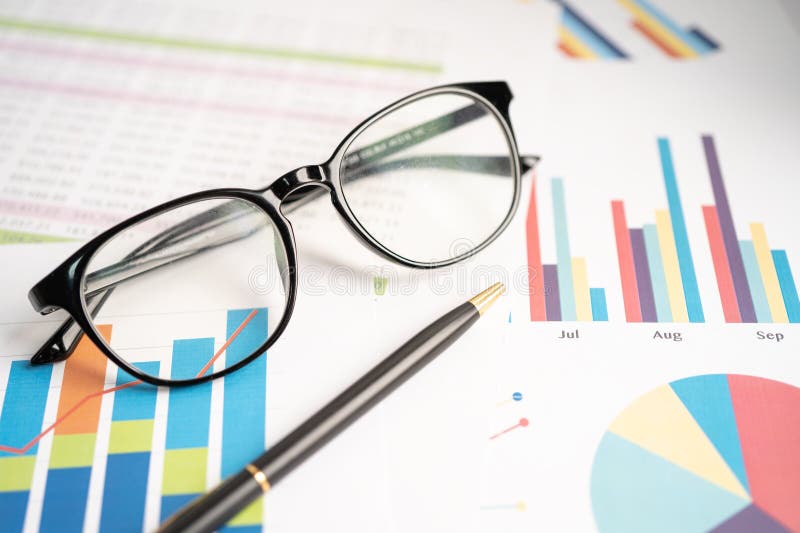 Eyeglass with Calculator on Chart Graph Paper. Finance, Account ... Eyeglass with Calculator on Chart Graph Paper. Finance, Account ...