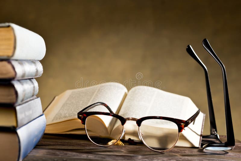 Eyeglasses with books stock photo. Image of books, closed - 74647608