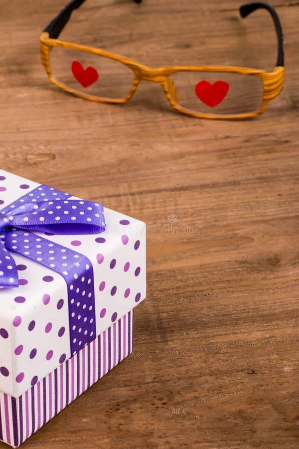 Eyeglasses and gift box stock image. Image of holiday - 43335321