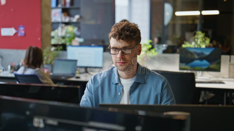 Eyeglasses Guy Corresponding Client Using Computer at Corporate Office ...